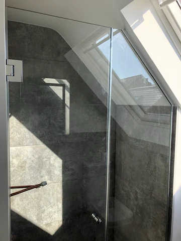 How to Install a Bespoke Shower Door and Panel for Attic/Loft Spaces